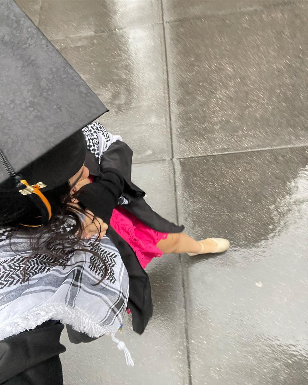 Princess Karma stands in solidarity with Palestine during her graduation